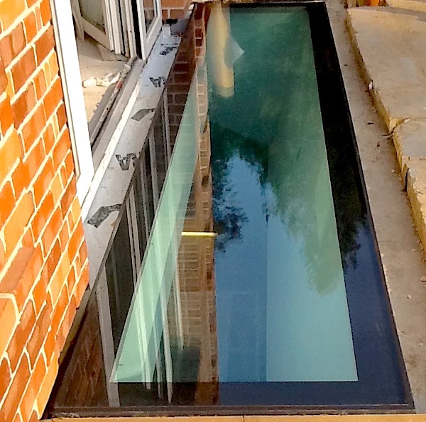 Walk on glass rooflight over basement cellar London | Structural Glass ...